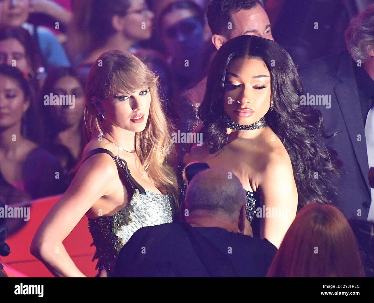 Elmont, USA. 12th Sep, 2024. Taylor Swift and Megan Thee Stallion pose ...