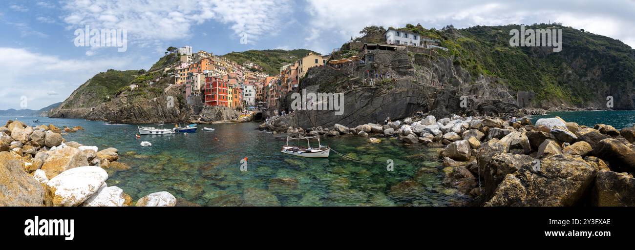 Panoramic view of Riomaggiore, Cinque Terre. Vibrant colors and ...