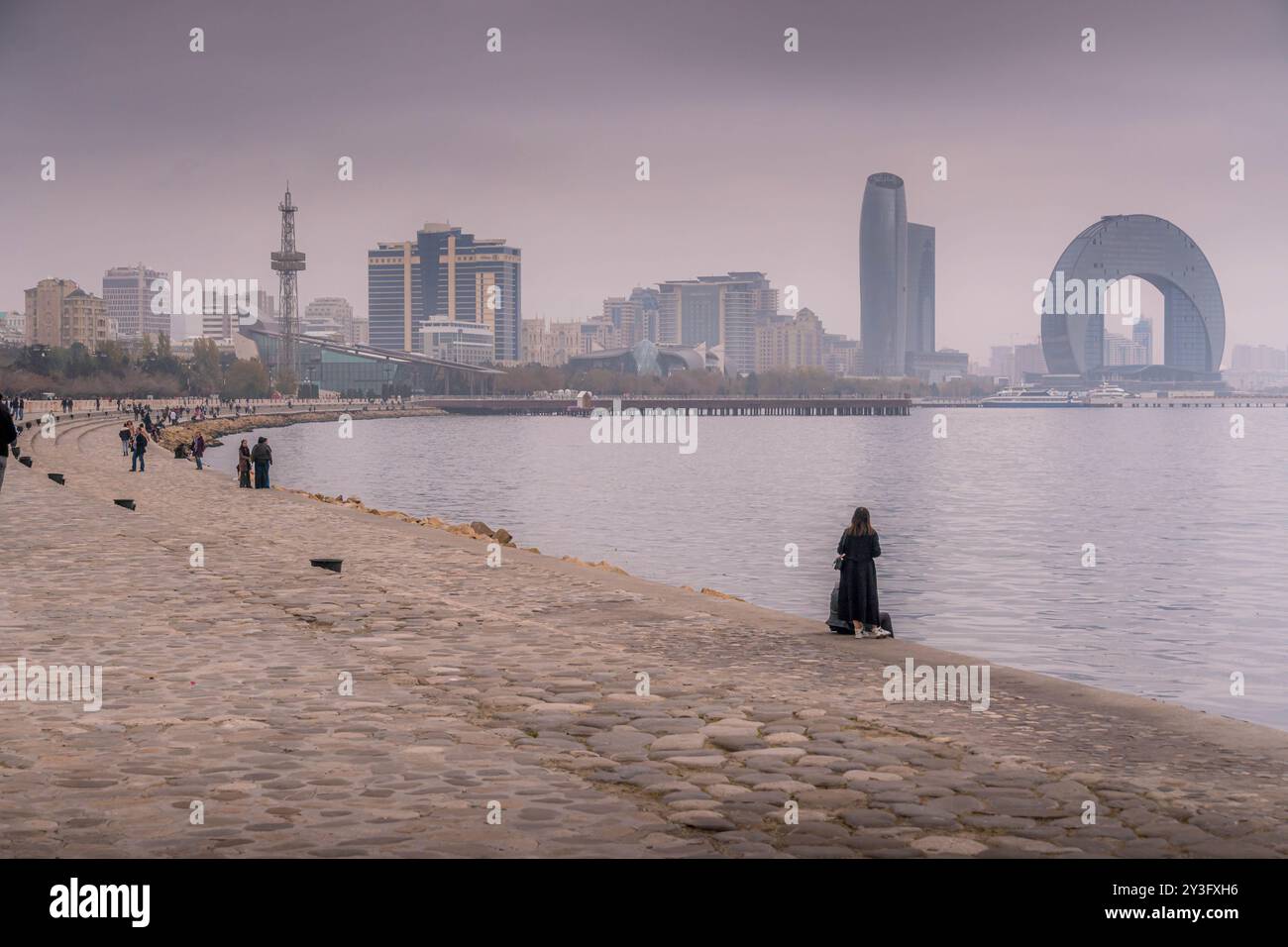 The Azerbaijani people on Baku promenade, at the Caspian Sea shore with ...