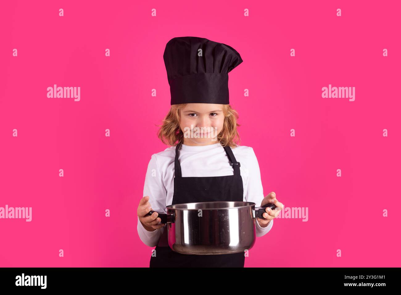 Child chef cook with cooking pot. Chef child preparing healthy food ... Child chef cook with cooking pot. Chef child preparing healthy food ...