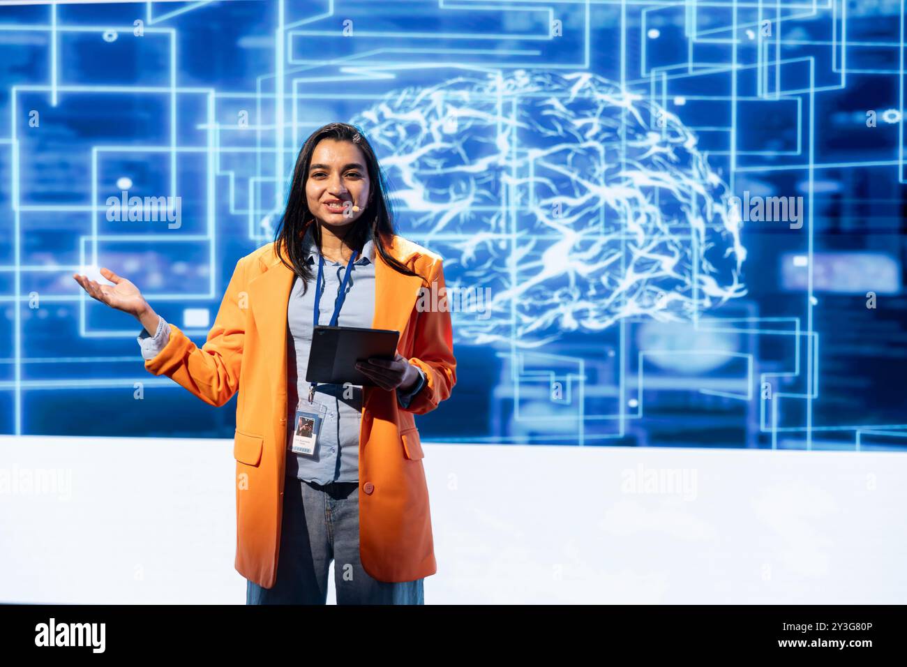 Cheerful engineer holding presentation at AI tech summit event ...