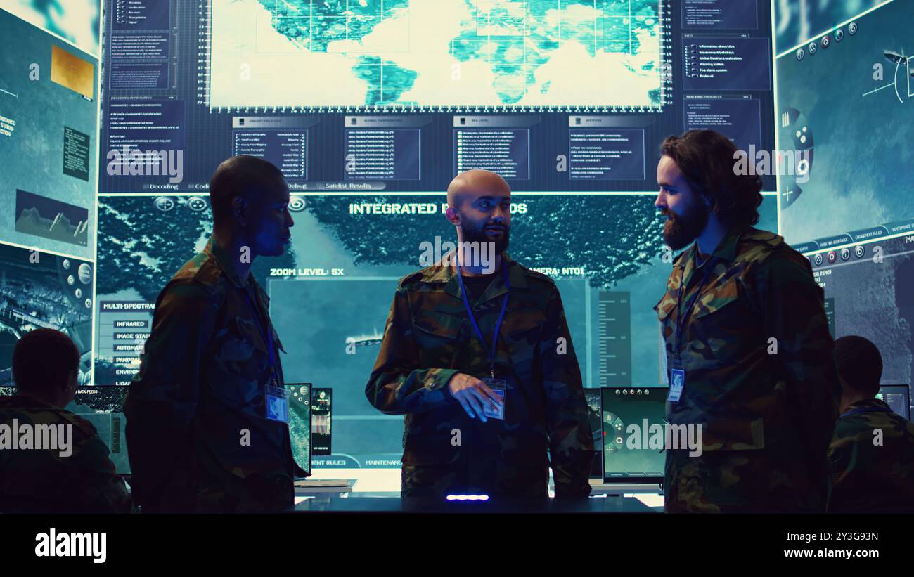 Navy operation specialists monitoring surveillance radar through a hologram, working with 3d ...