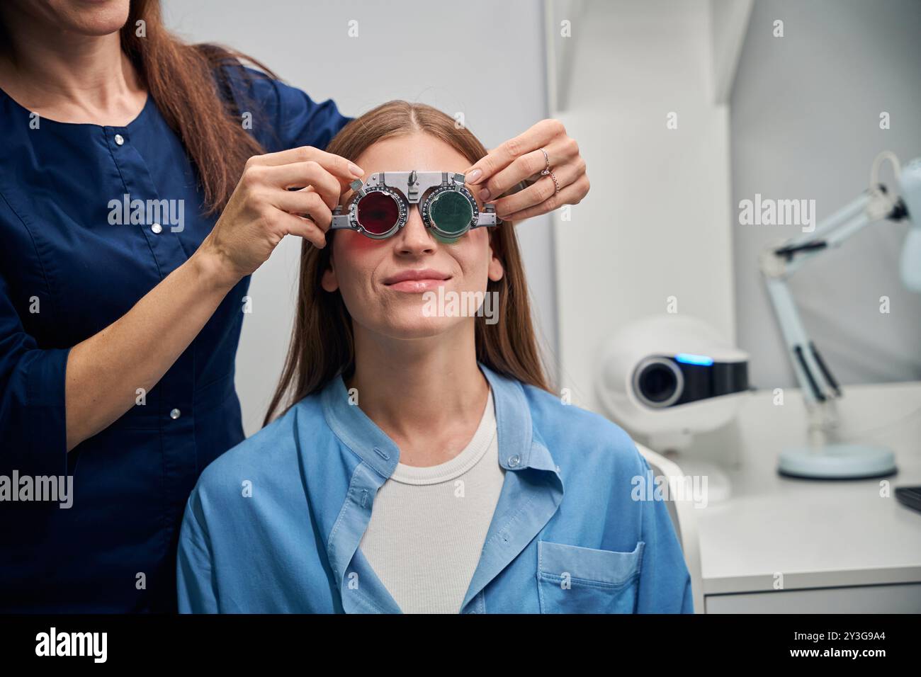 Optometrist adjusts equipment hi-res stock photography and images - Alamy