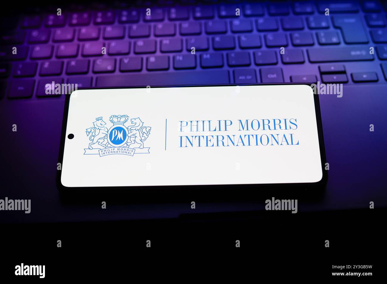 In this photo illustration, the Philip Morris International logo is ...