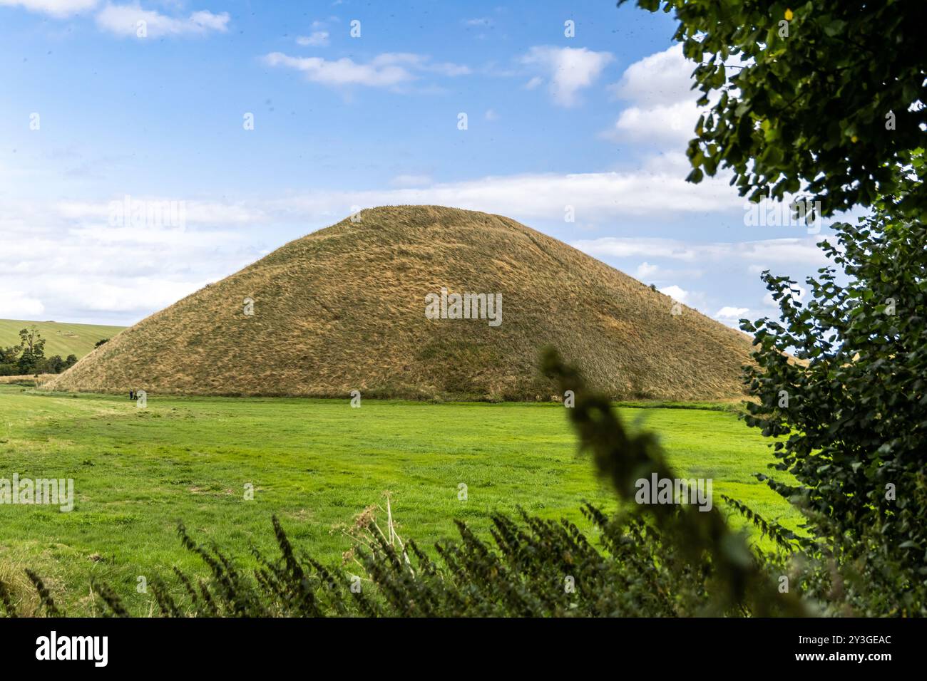 Silbury Hill, near Avebury, Wiltshire, England. It is the largest ...
