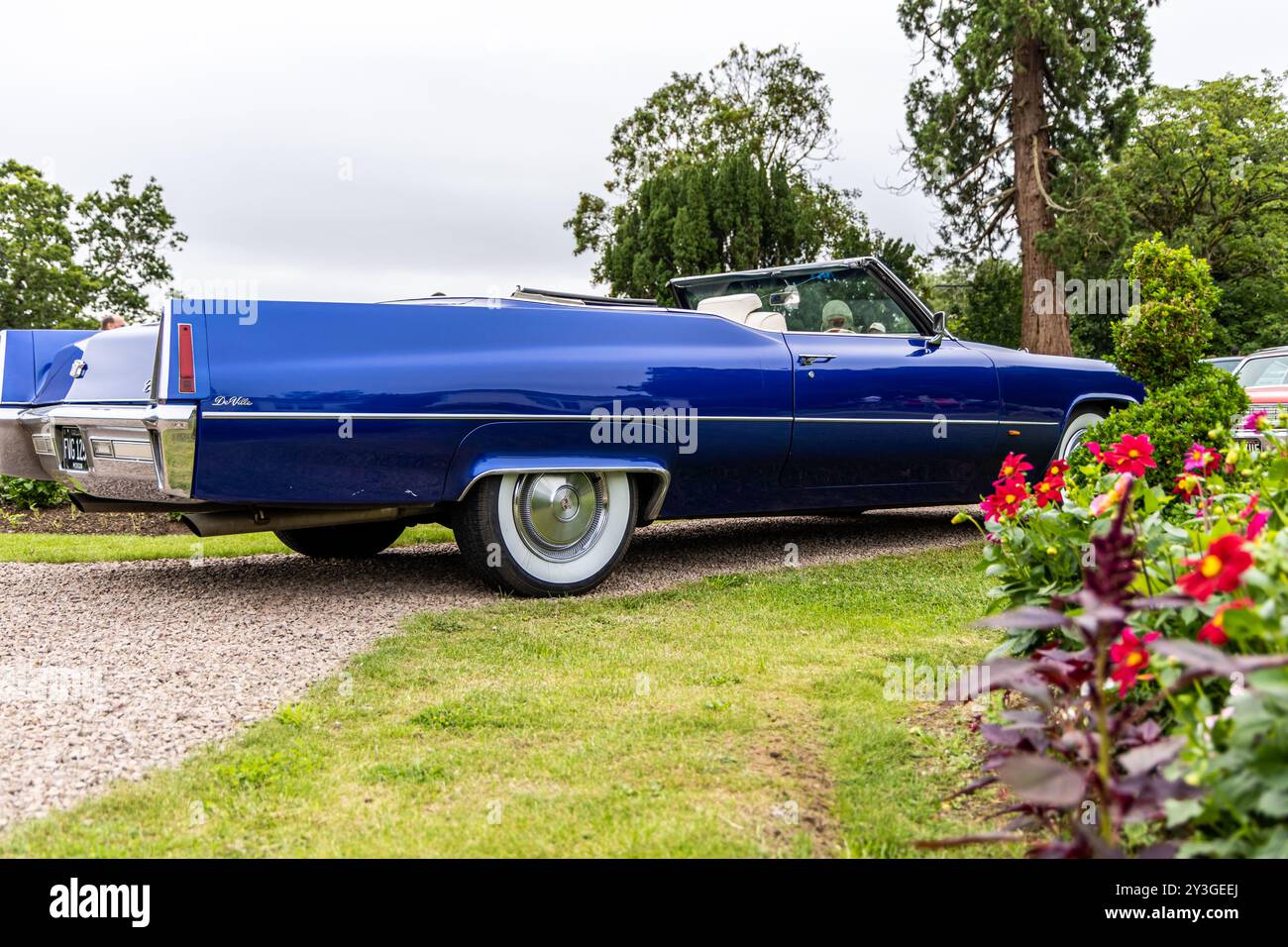 Bristol, UK- August 11, 2024: Side of Blue Cadillac DeVille Convertible ...