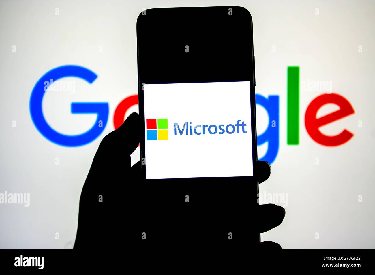 In this photo illustration, a Microsoft logo seen displayed on a ...