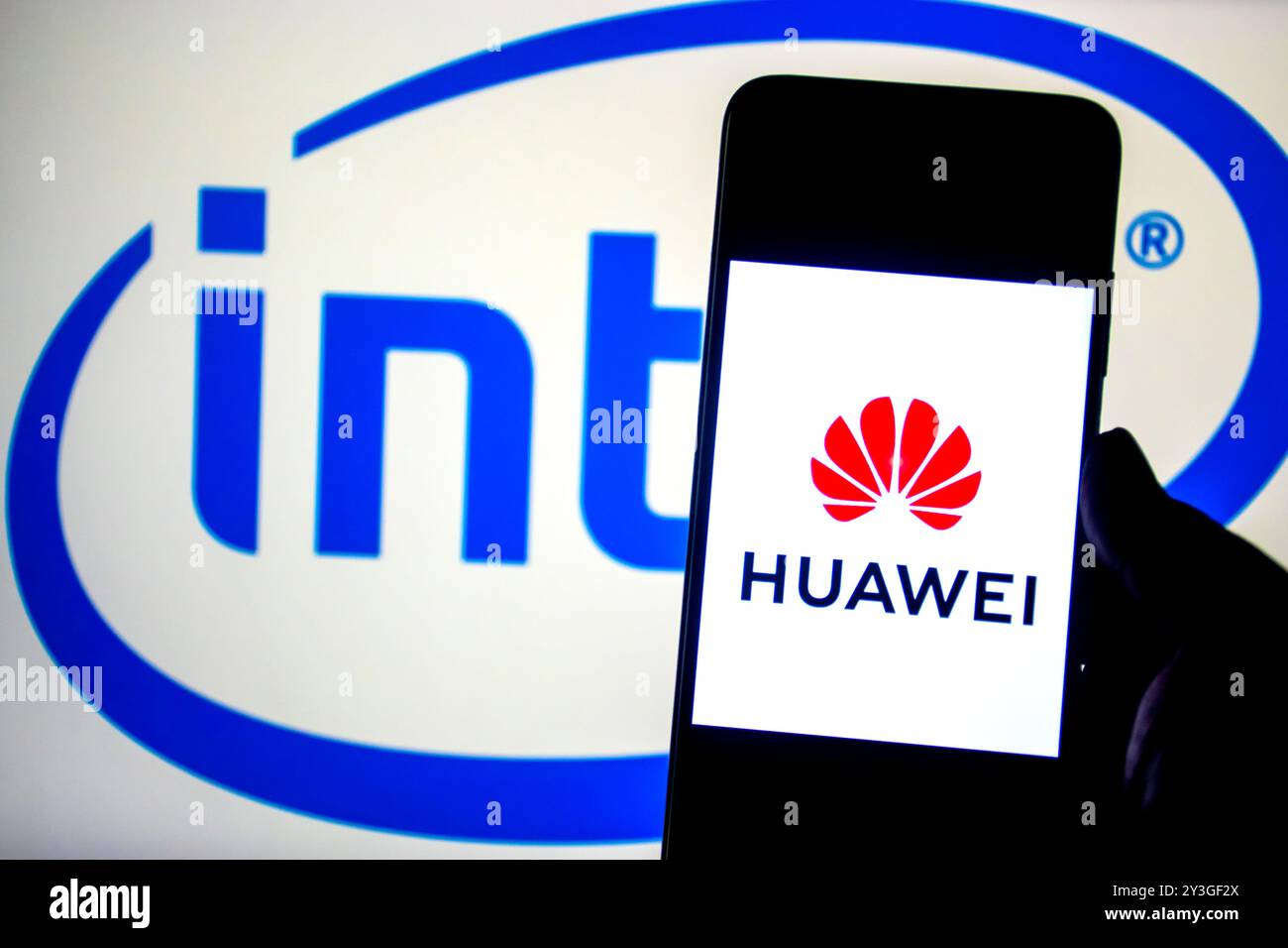 In this photo illustration, a Huawei logo seen displayed on a ...