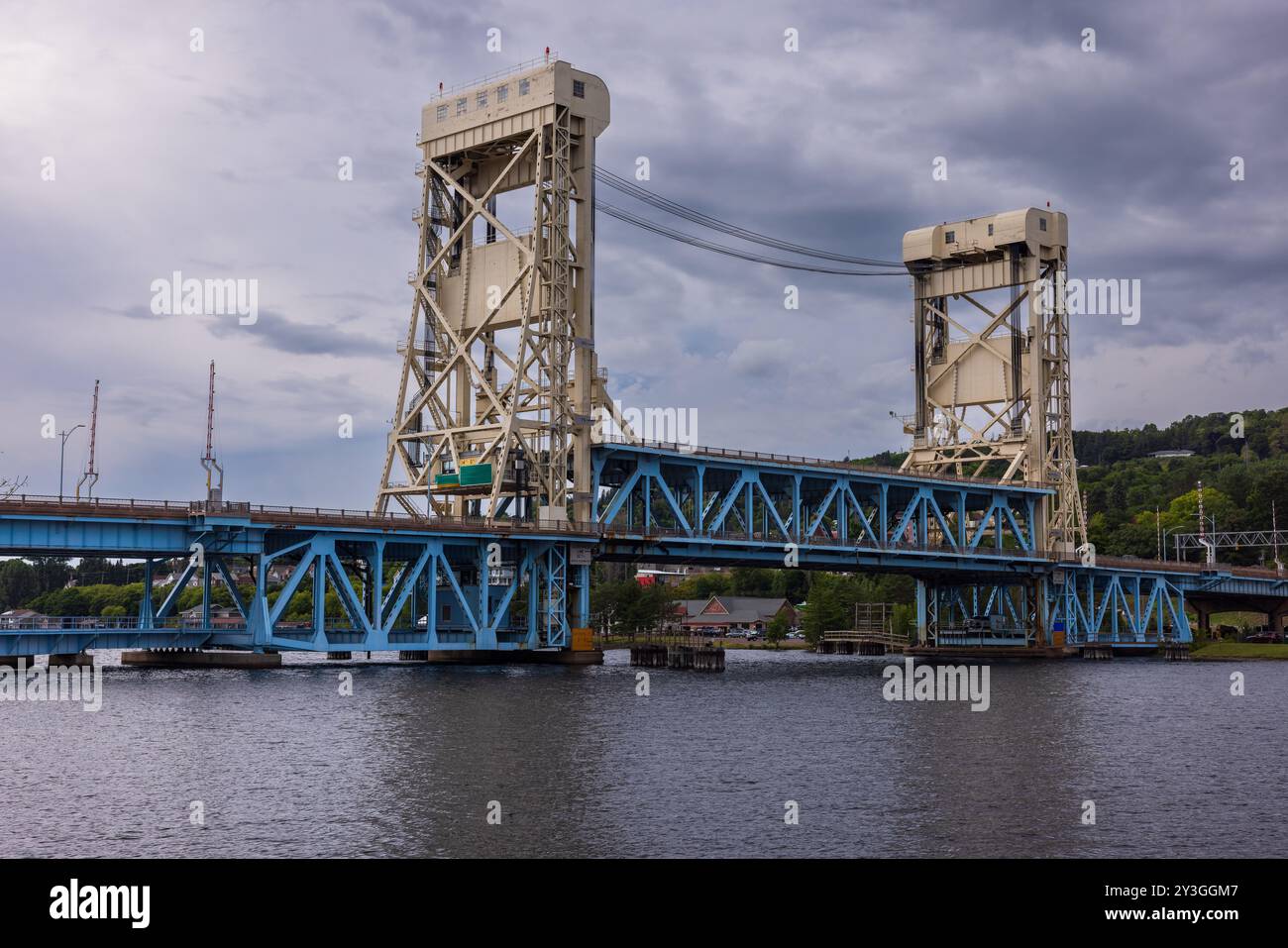 A double deck lift bridge crossing a river Stock Photo - Alamy