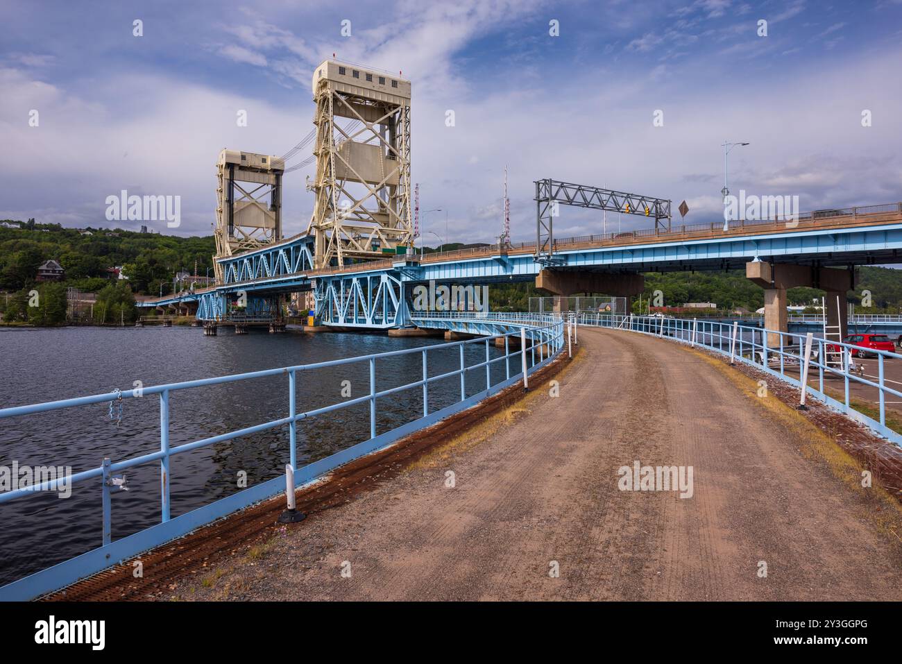A double deck lift bridge crossing a river Stock Photo - Alamy