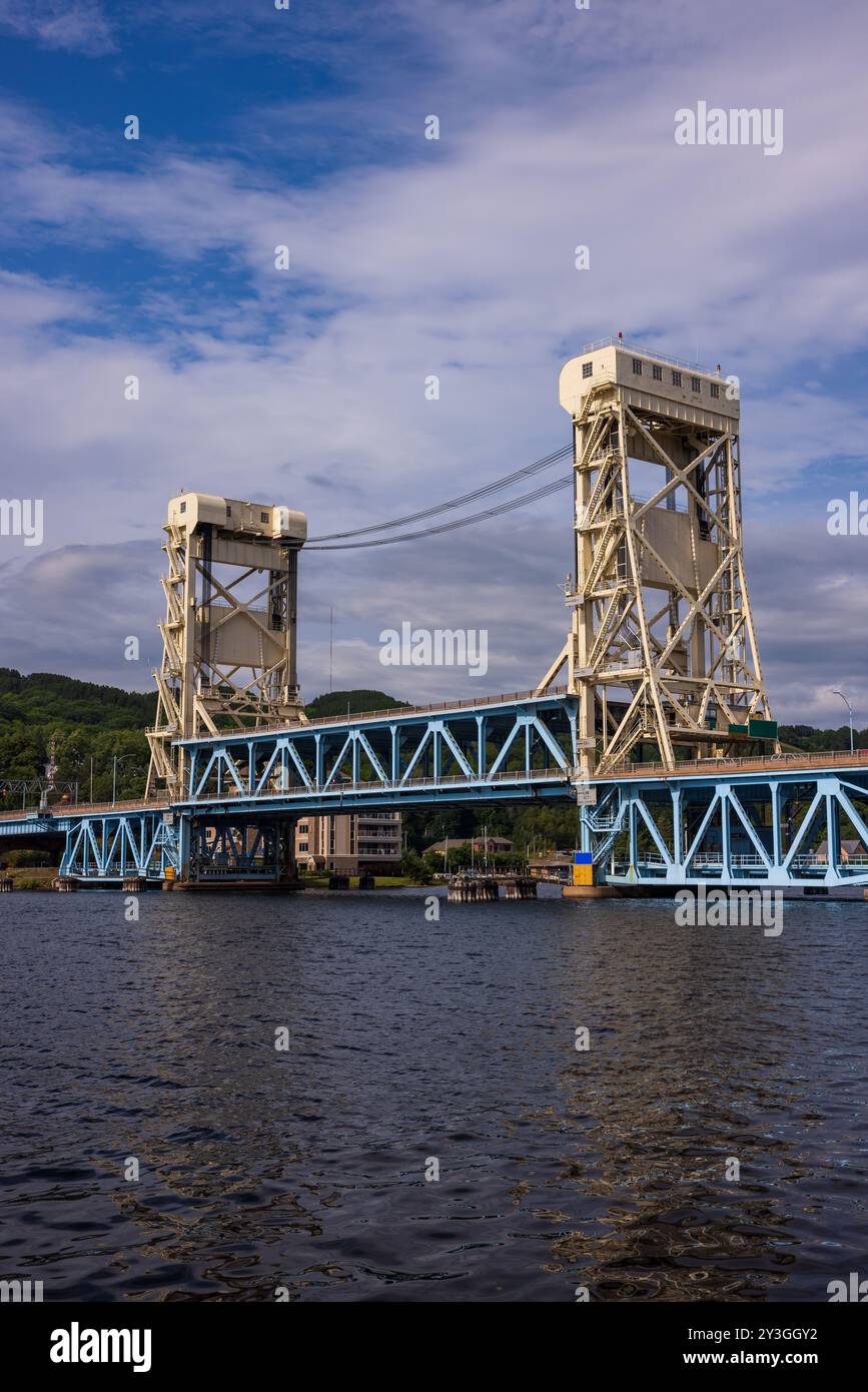 A double deck lift bridge crossing a river Stock Photo - Alamy