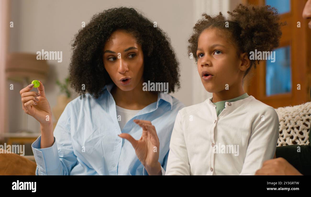 Mother teacher nurse speech therapist learning sounds letters words ...