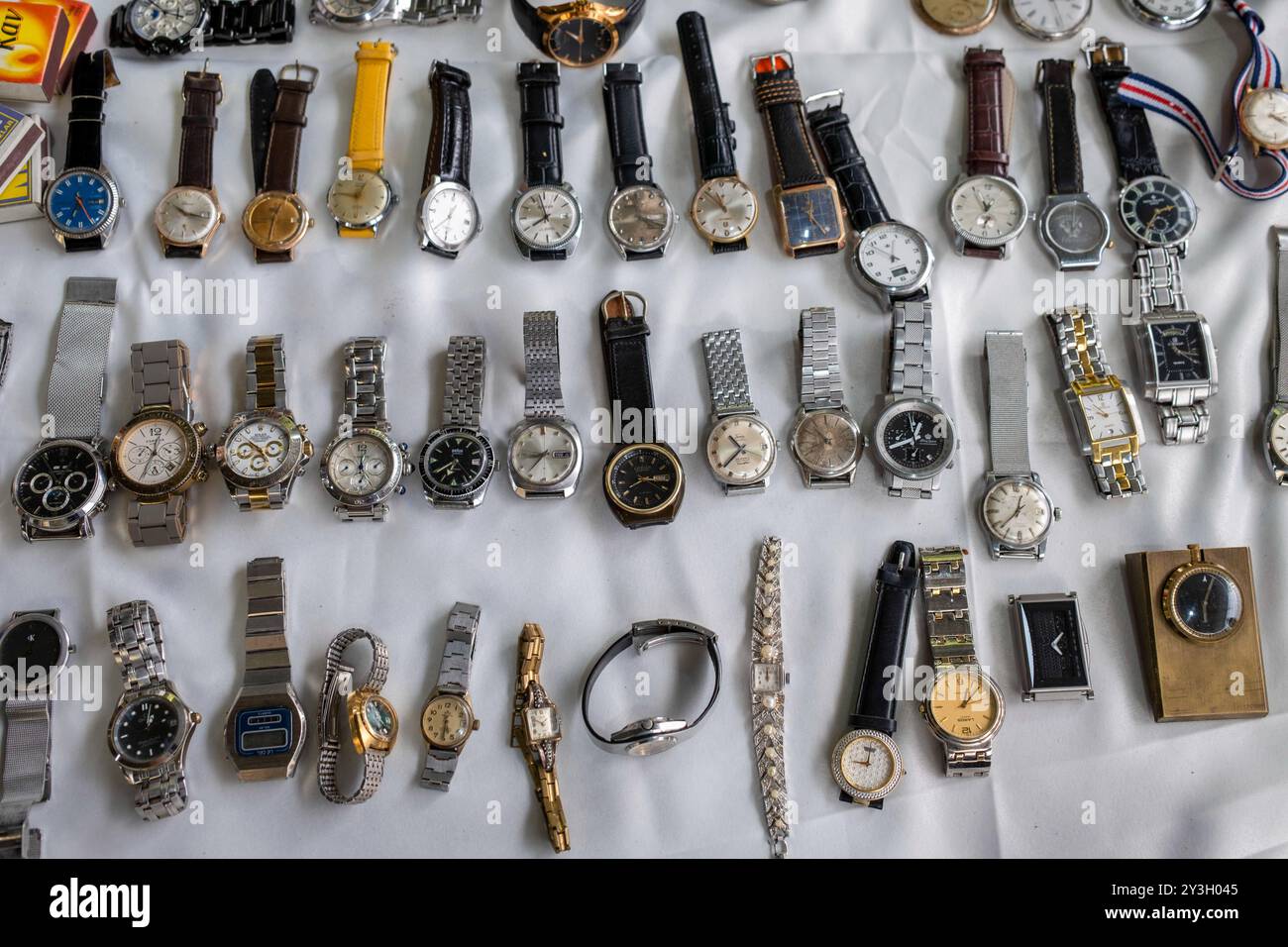 Old coins and watch on display hi-res stock photography and images - Alamy