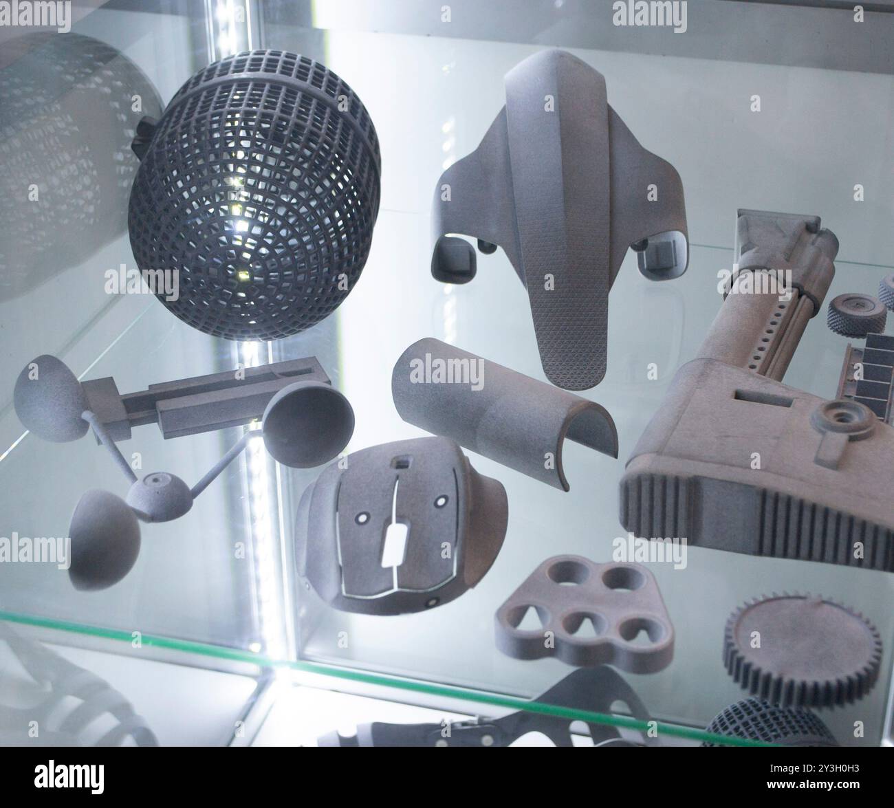 Various objects printed on a 3D printer from molten plastic powder ...