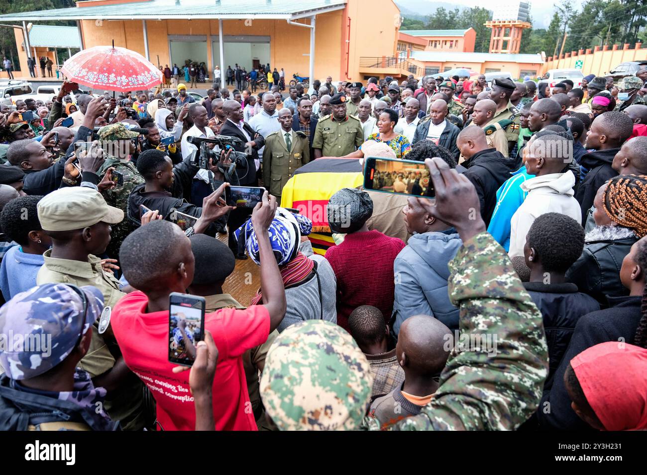 Bukwo. 13th Sep, 2024. People surround the coffin of the late Olympian ...