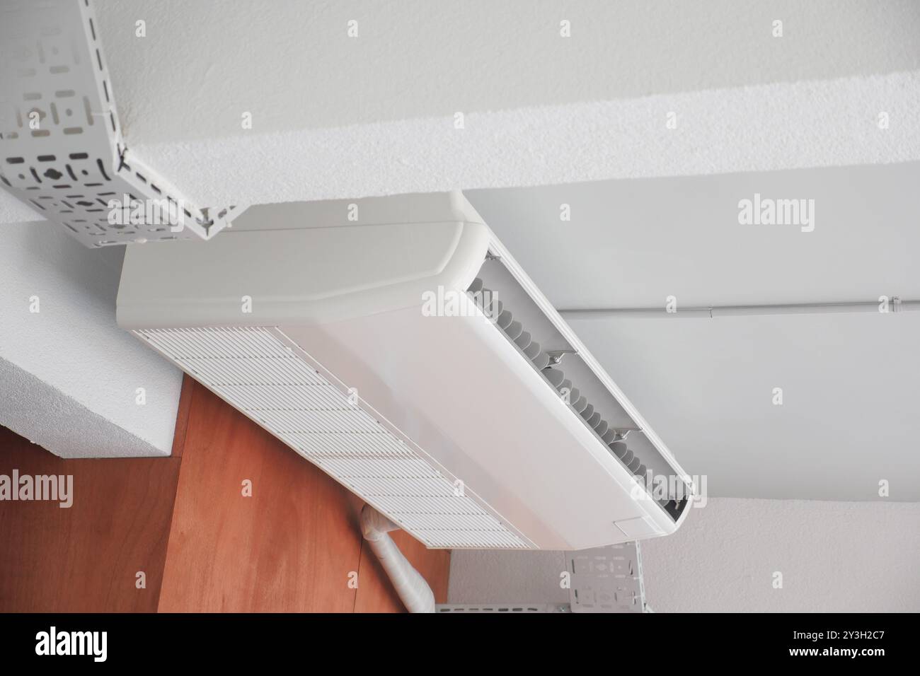 A contemporary modern air conditioning unit has been expertly installed ...