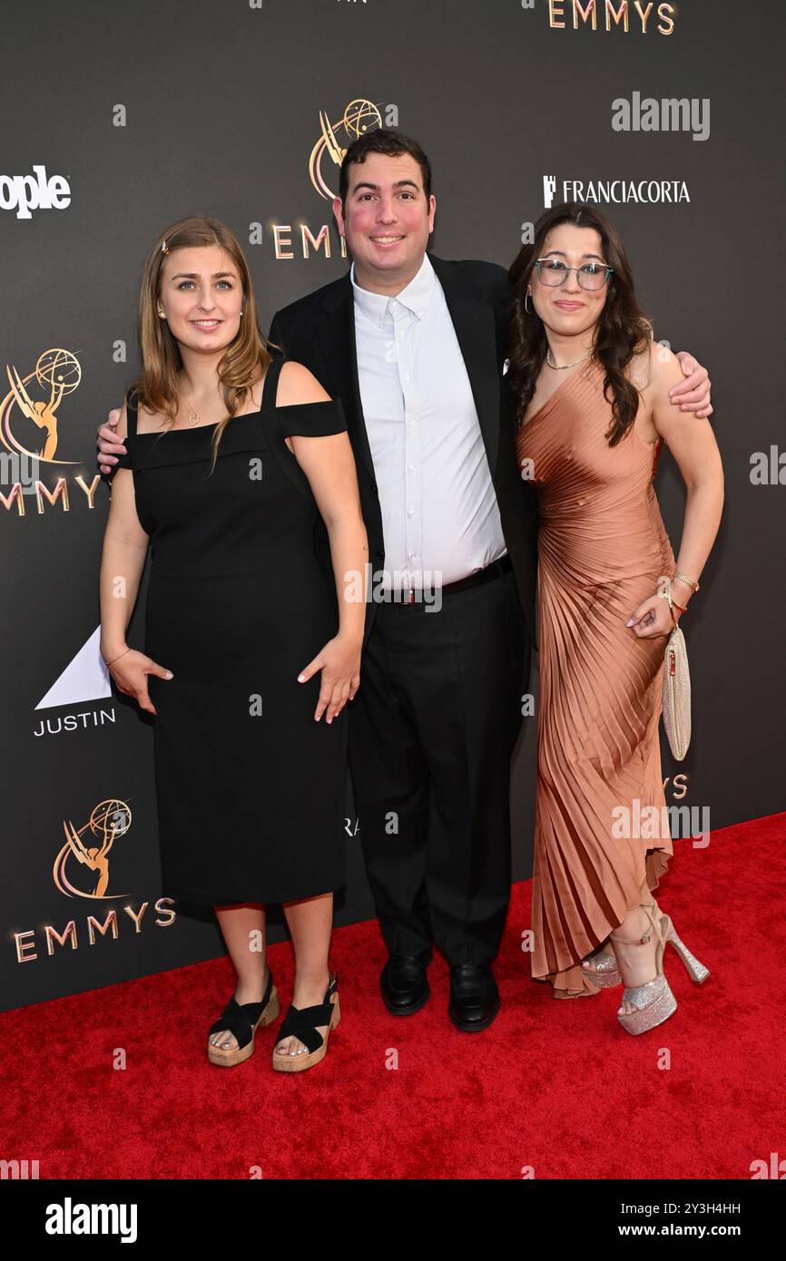 Abbey Romeo, from left, David Isaacson and Dani Bowman attend the 76th ...