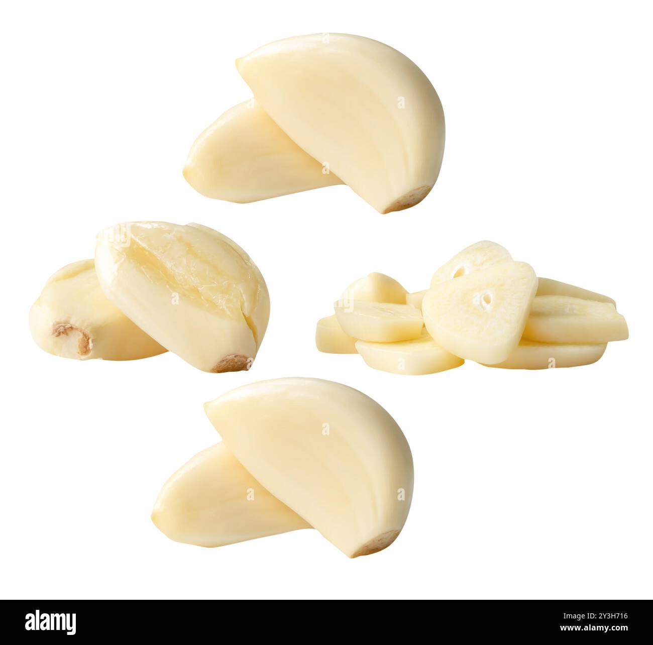 Side view set of fresh peeled white garlic cloves with slices in stack ...