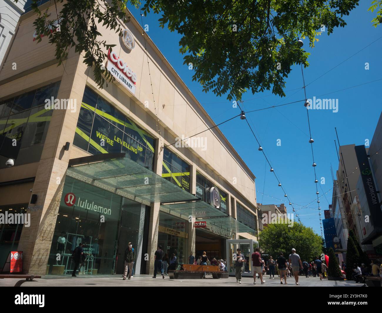 View of Rundle Mall and shops in the city on a sunny day in Adelaide ...