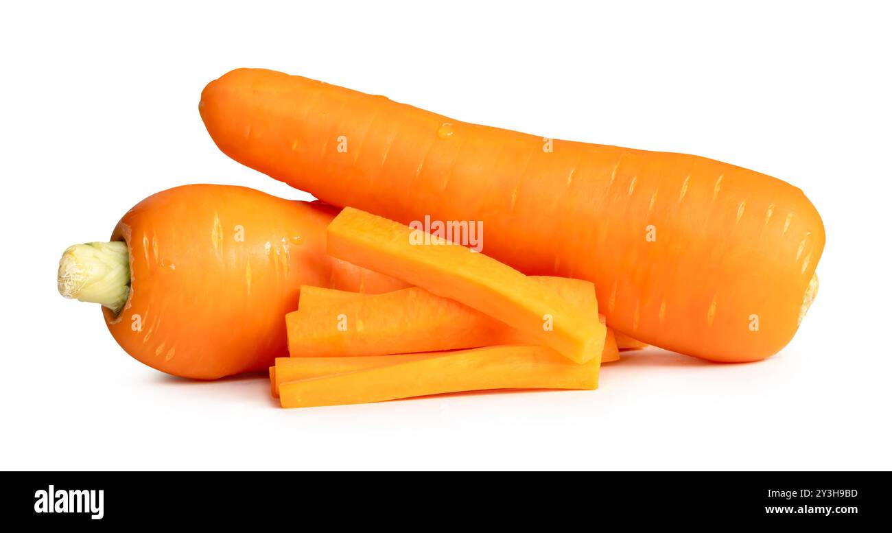 Side view of fresh orange carrot roots with slices in stick shape in ...