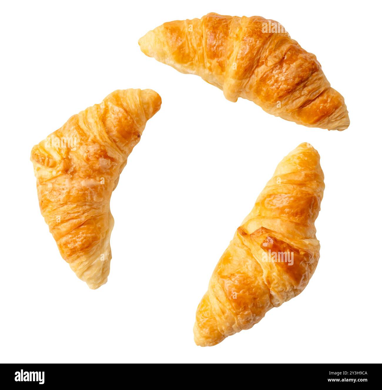 Top view set of gold or brown croissants is isolated on white ...