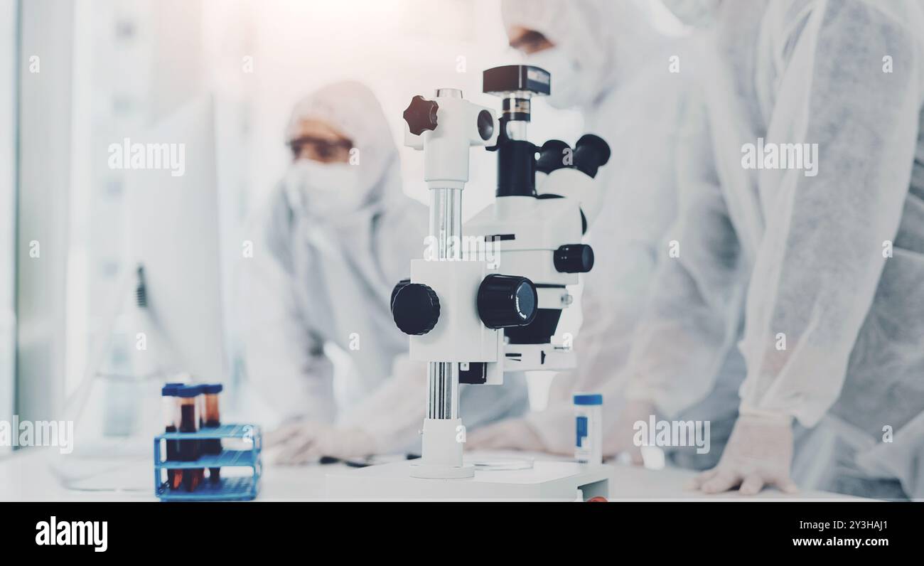 Healthcare, group and blood sample in hospital, microscope and ...