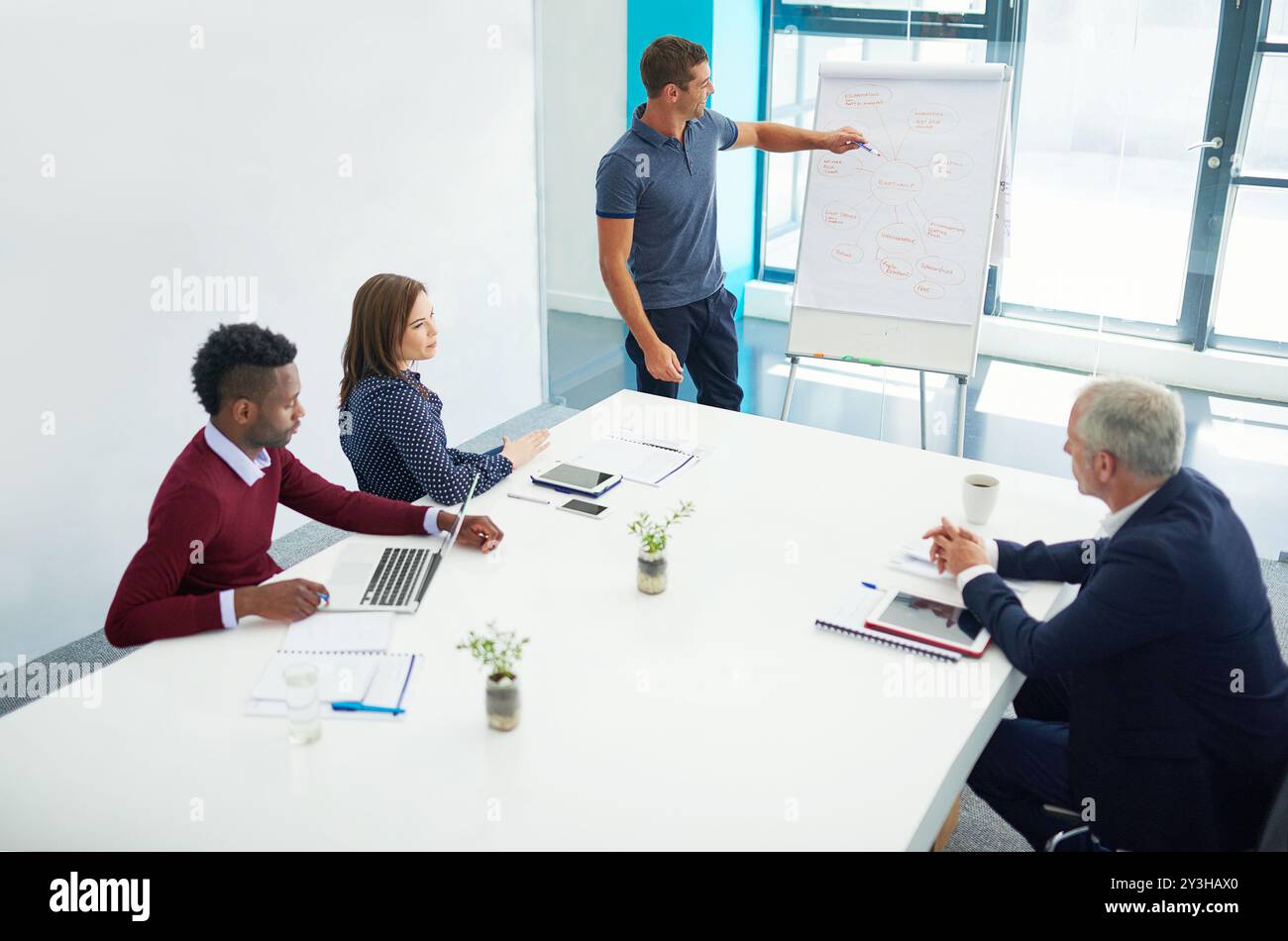 Business man, pitch meeting and presenter with board data with ...