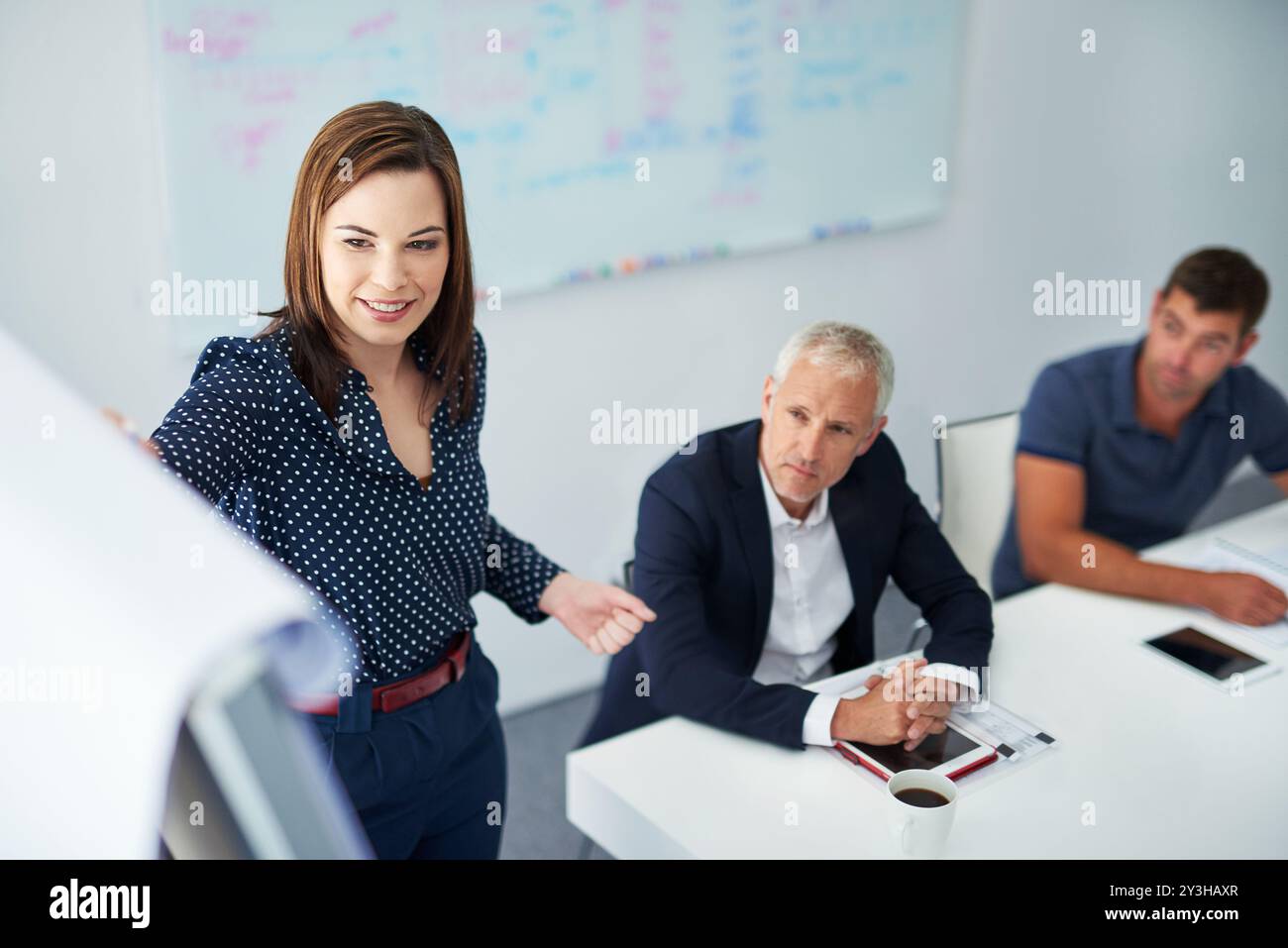 Business woman, pitch meeting and board with office data with ...