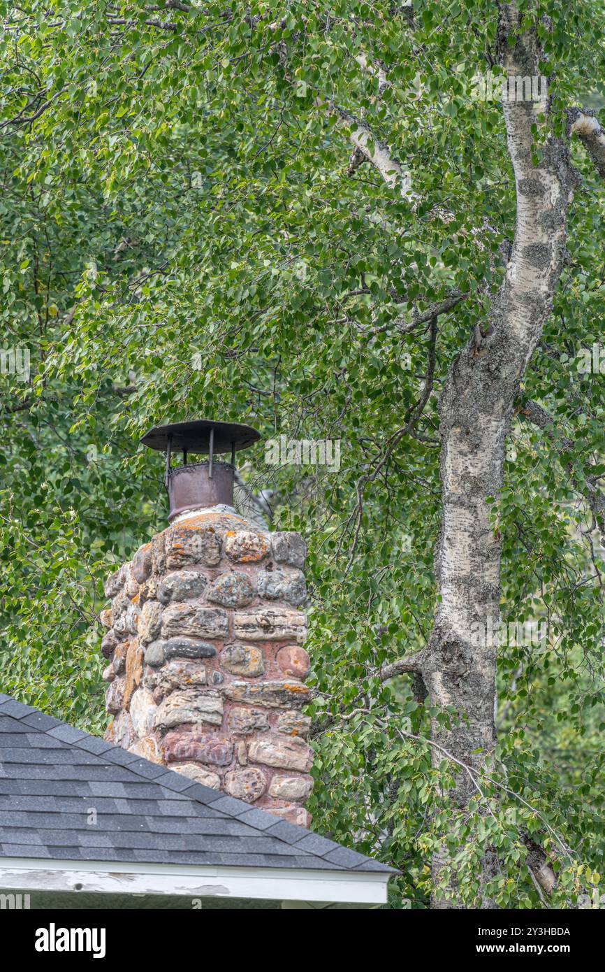 old stone Chimney on top of a house Stock Photo - Alamy