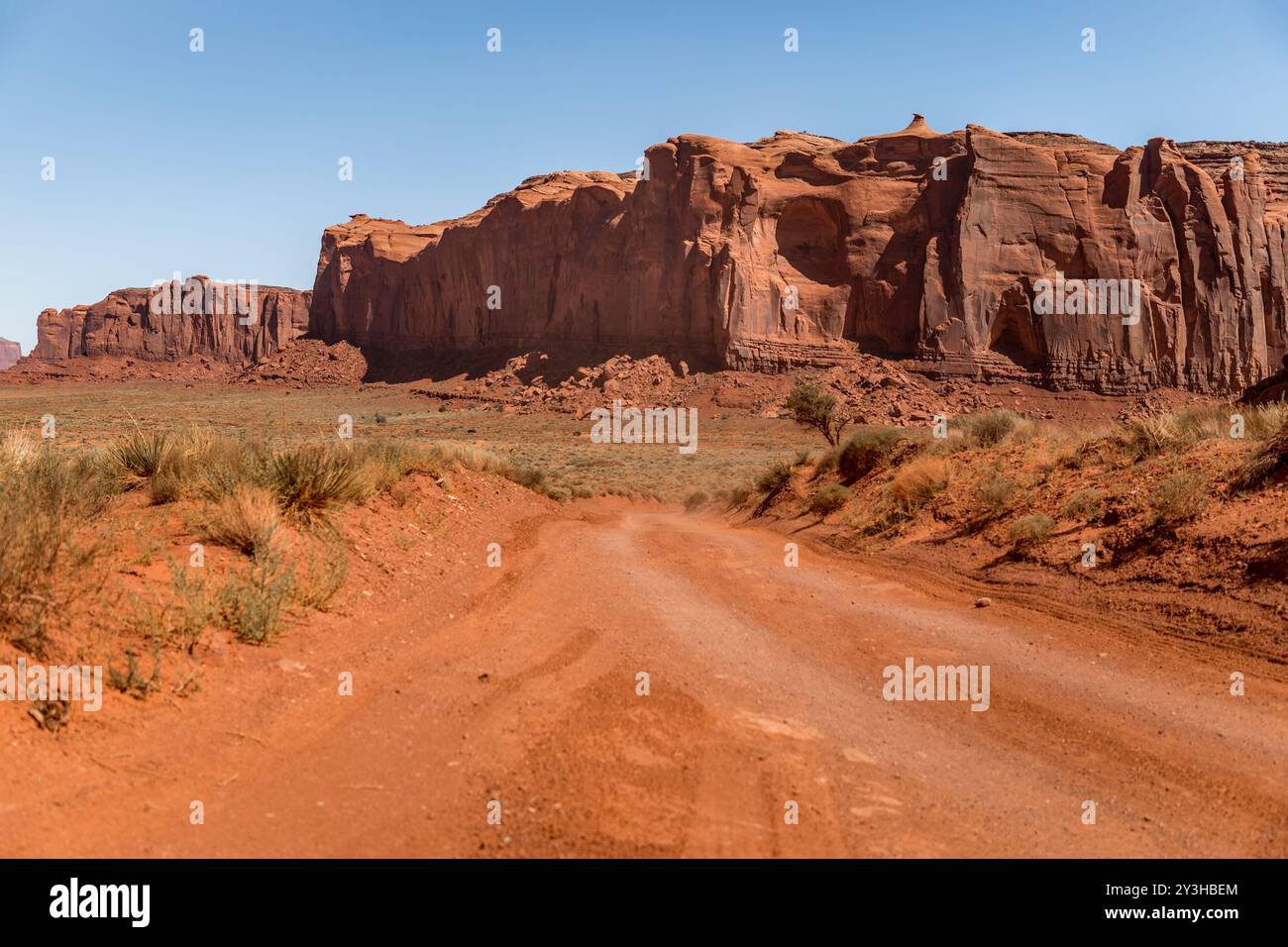 Scenic dirt road in the monuments in the Monument Valley, Arizona USA ...