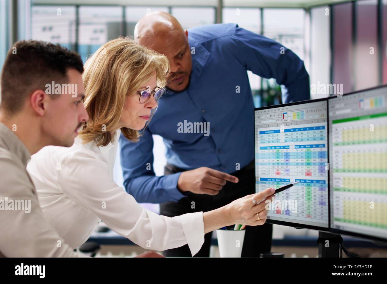 Analyst Employee Working On Spreadsheet Using Desktop Computer Stock ...