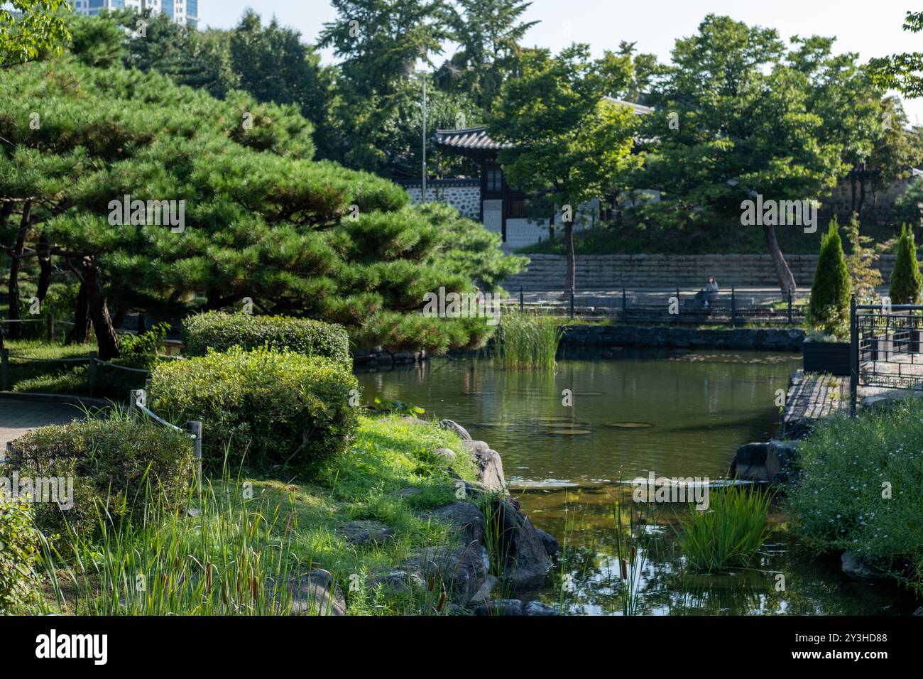 View of the pond and garden in Namsangol Hanok village, a recreated ...