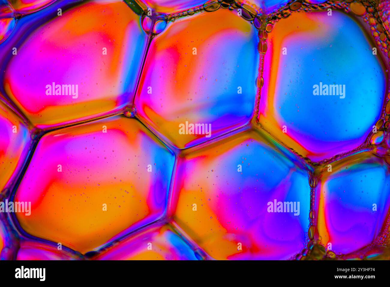 Macro photo of water drops in psychedelic colours Stock Photo - Alamy