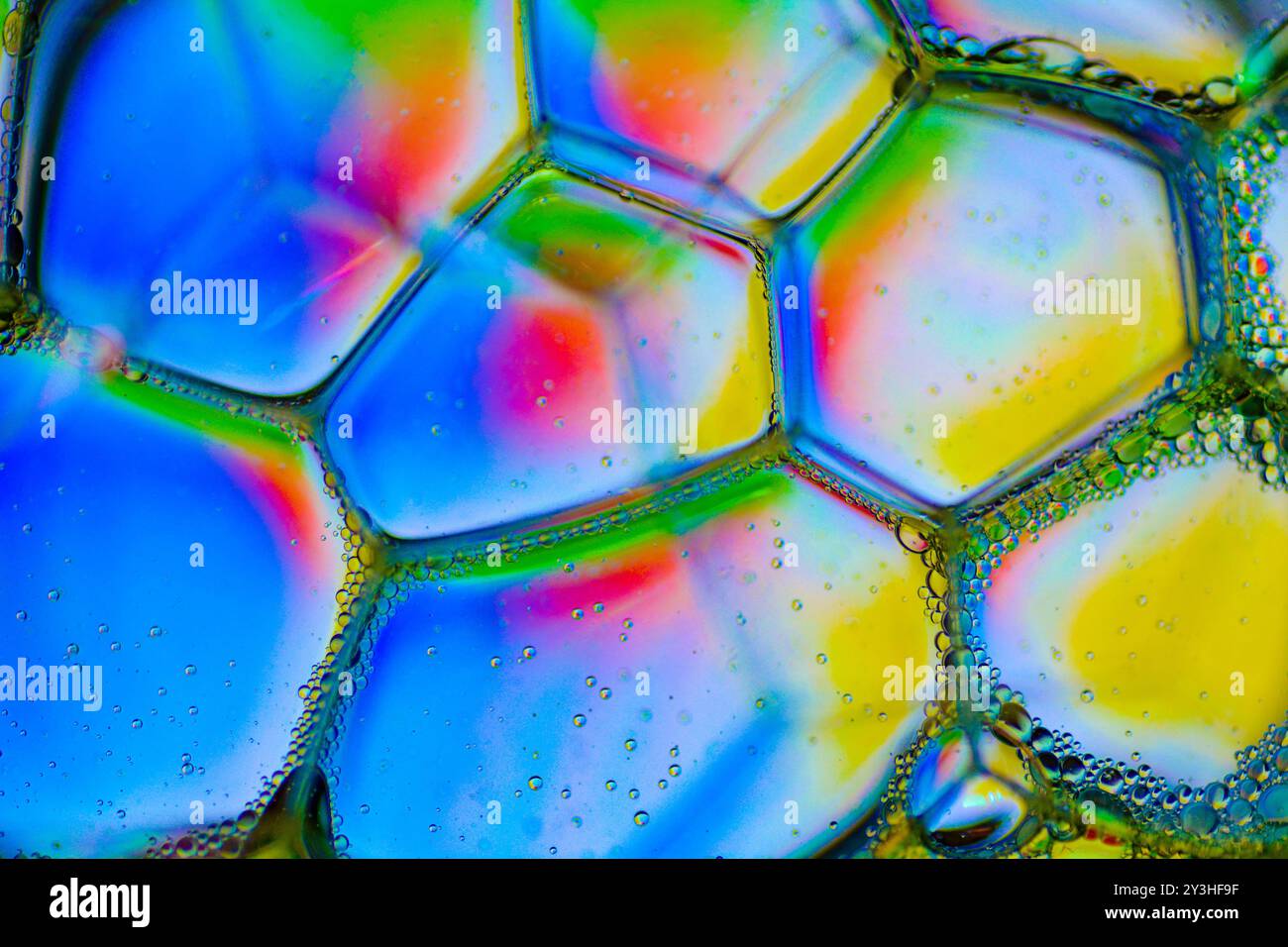 Macro photo of water drops in psychedelic colours Stock Photo - Alamy
