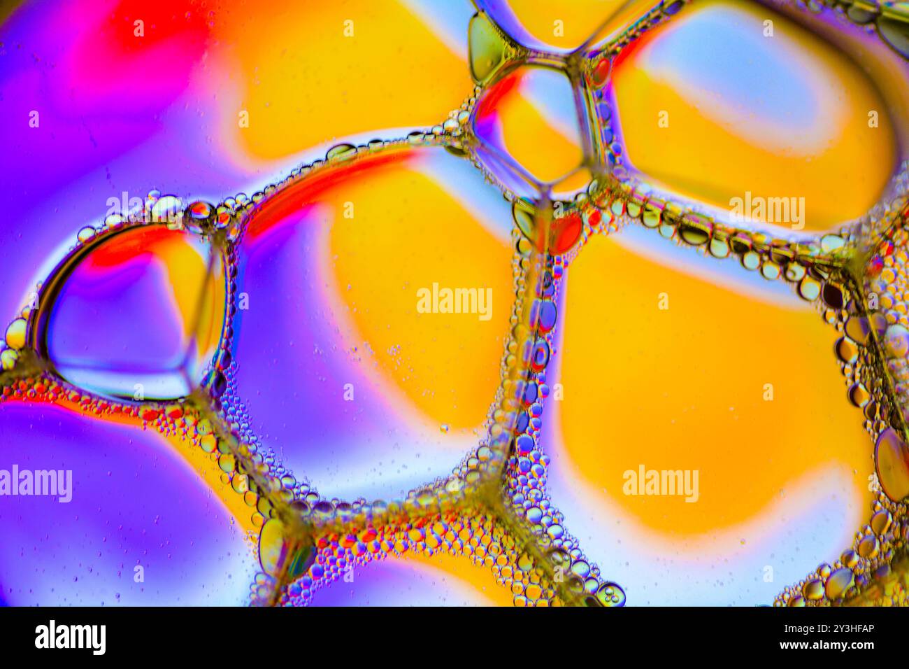Macro photo of water drops in psychedelic colours Stock Photo - Alamy