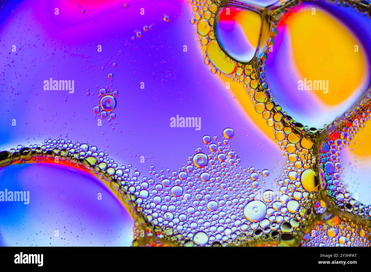 Macro photo of water drops in psychedelic colours Stock Photo - Alamy