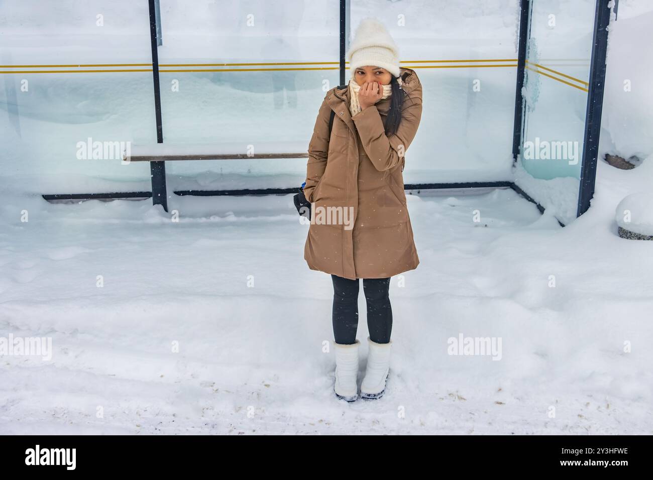 Woman standing bus stop hi-res stock photography and images - Alamy