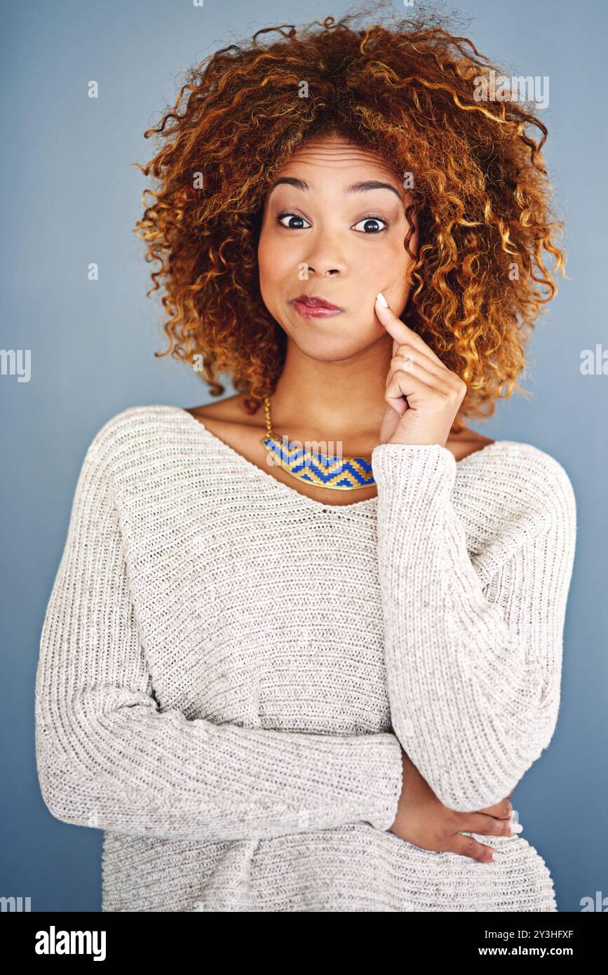 Thinking, creative and portrait of woman in studio as textile artist ...