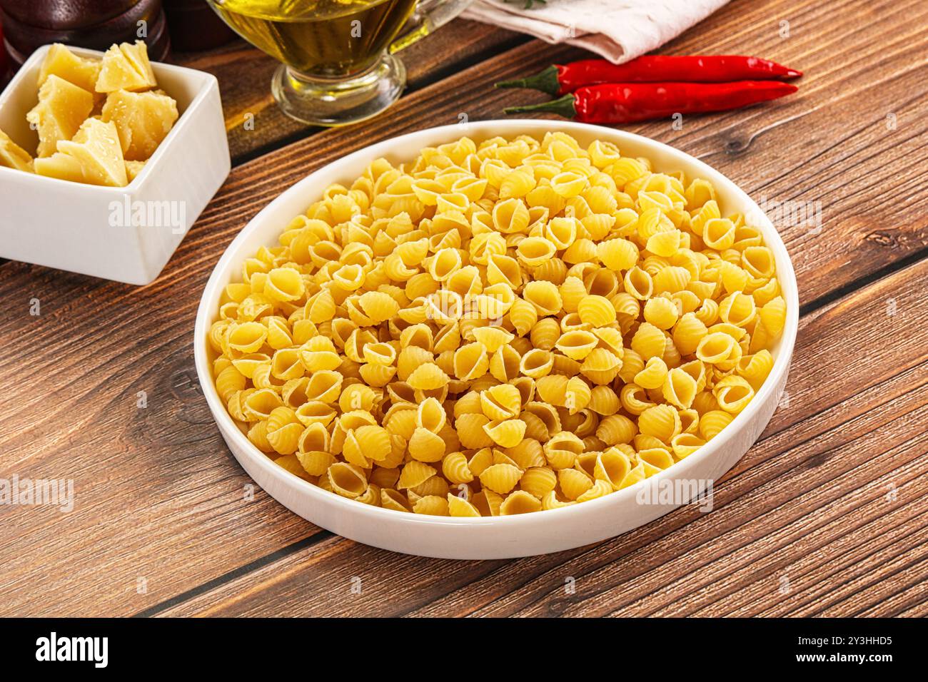 Italian cuisine - dry conchiglie shell pasta Stock Photo - Alamy
