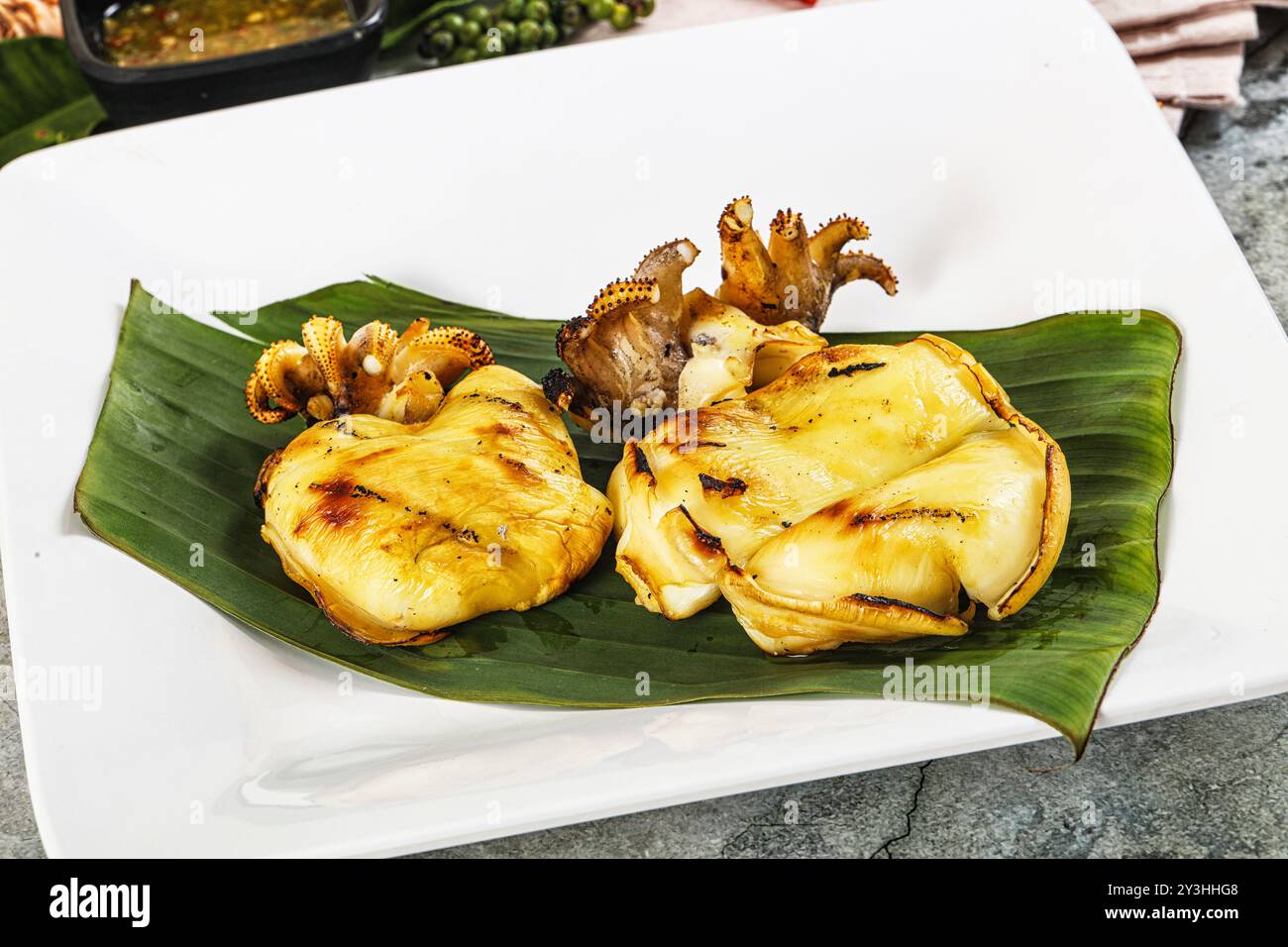 Delicous Grilled cuttlefish with sauce asian style Stock Photo - Alamy