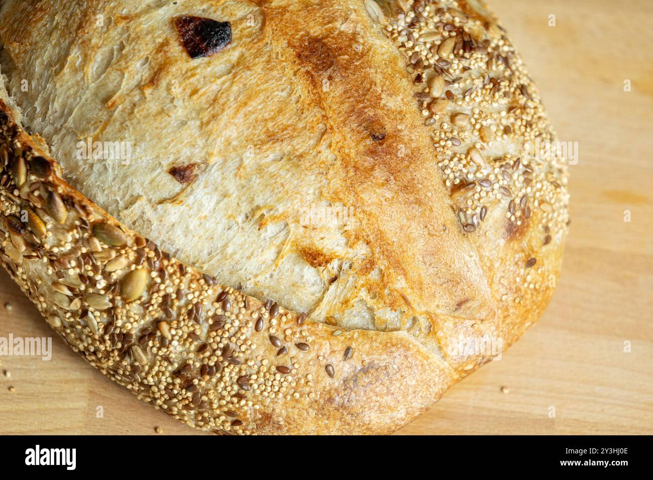 Homemade freshly bread. Sourdough wheat rye loaf with seeds top view ...