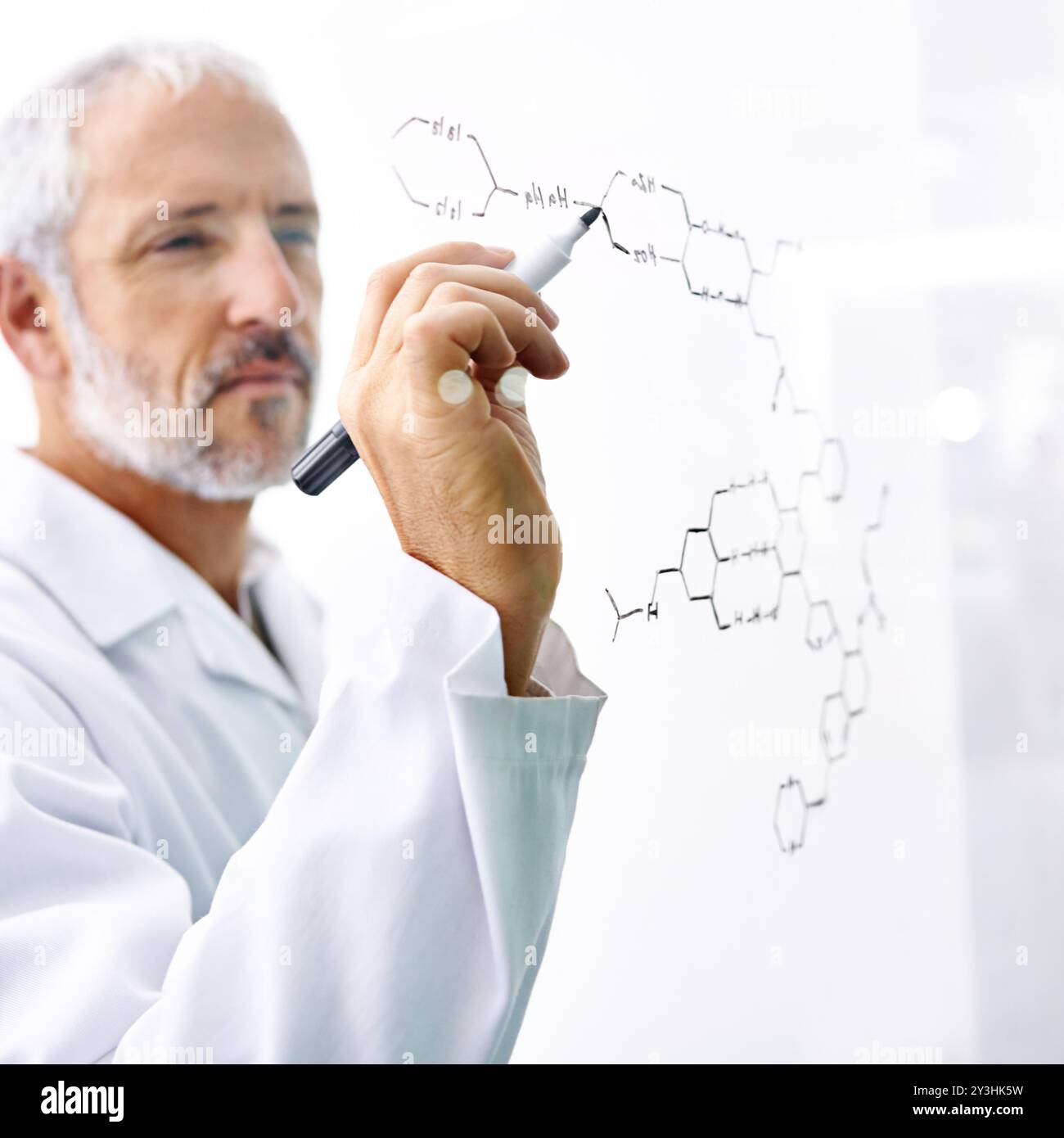 Man, writing and science by glass wall in lab with formula, chemistry ...