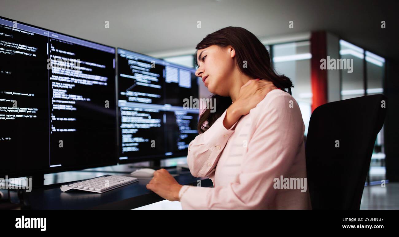 Programmer Girl With Back Pain From Bad Posture Stock Photo - Alamy