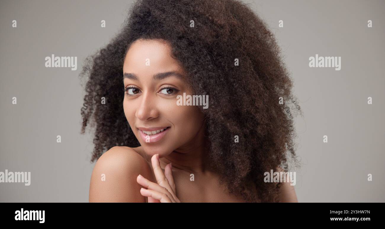 Beauty and healthcare concept - beautiful African American woman with ...