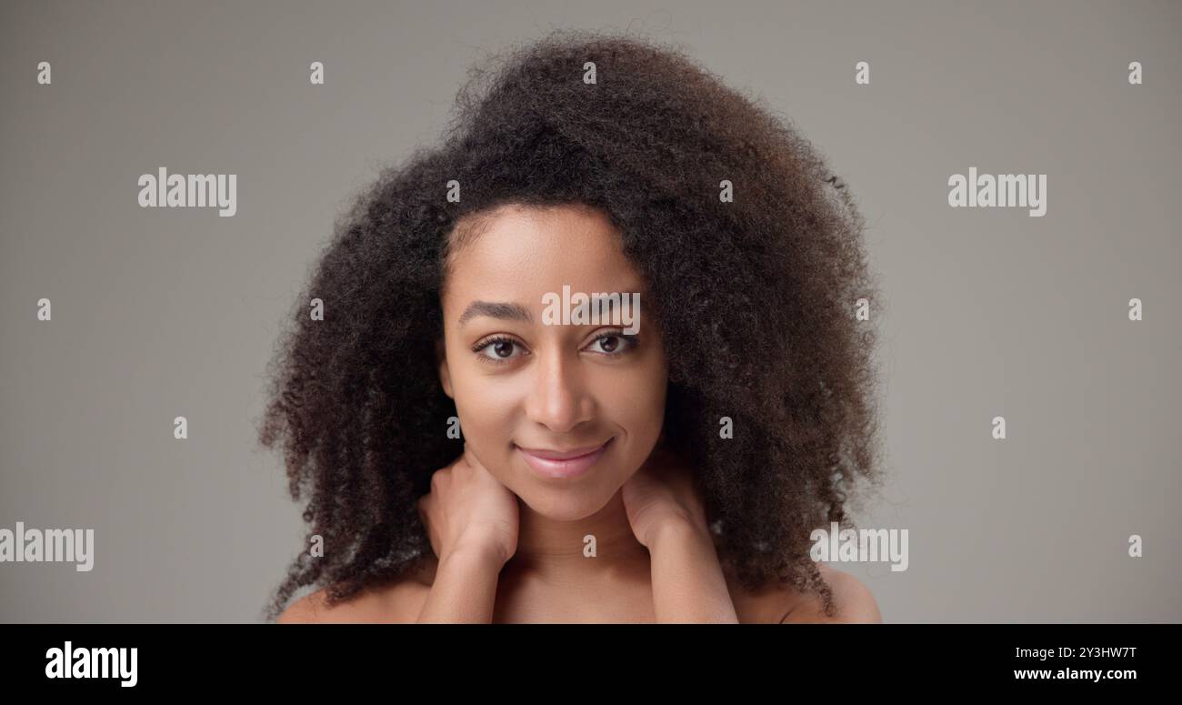 Beauty and healthcare concept - beautiful African American woman with ...