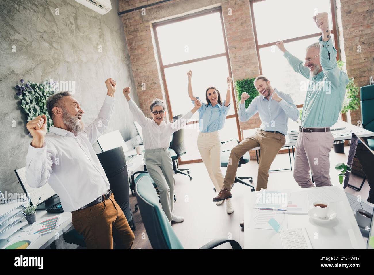 Full body photo of teamwork people working together winning celebrate ...