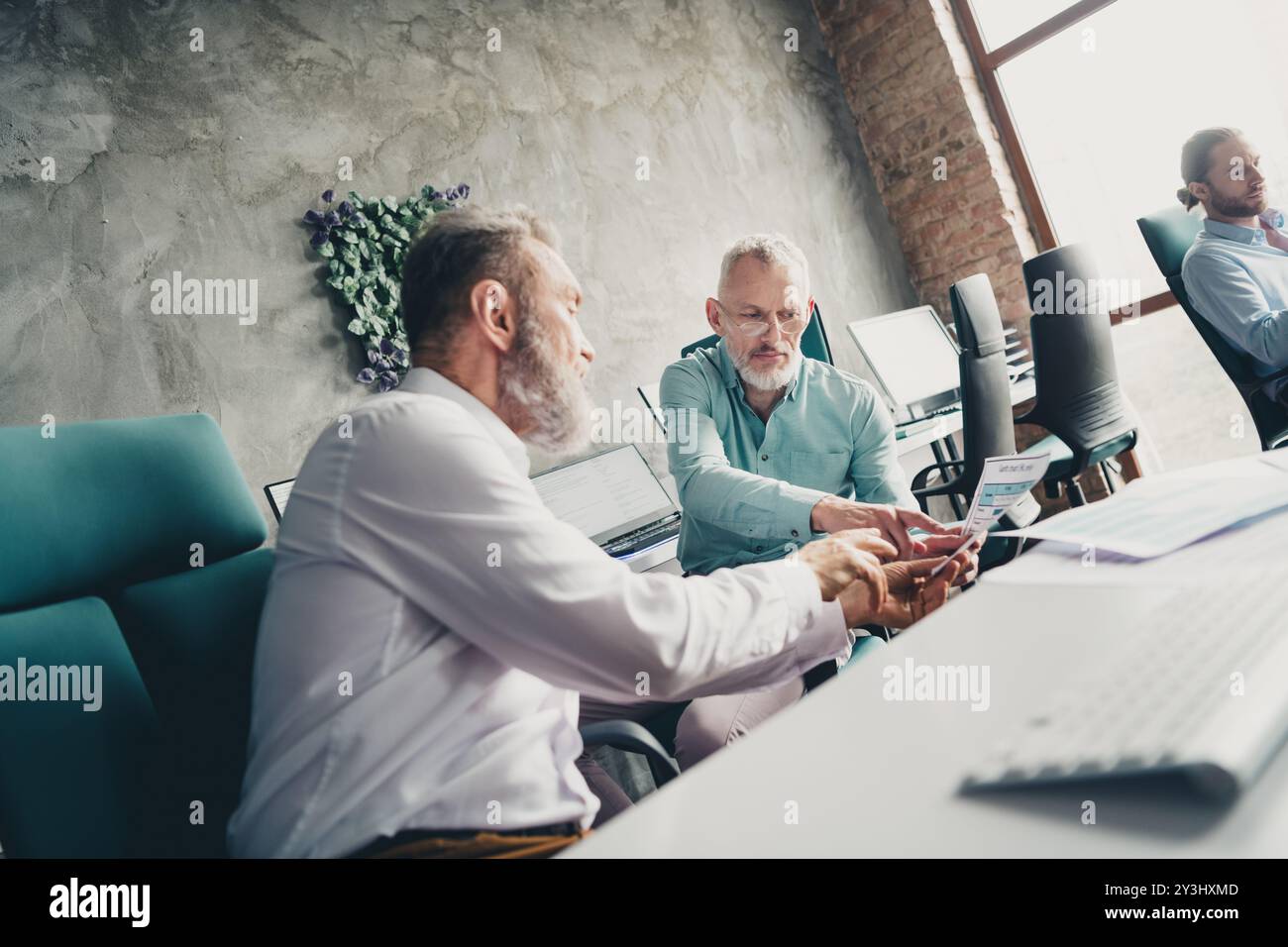 Photo of teamwork startup partners documents graph discussion ...