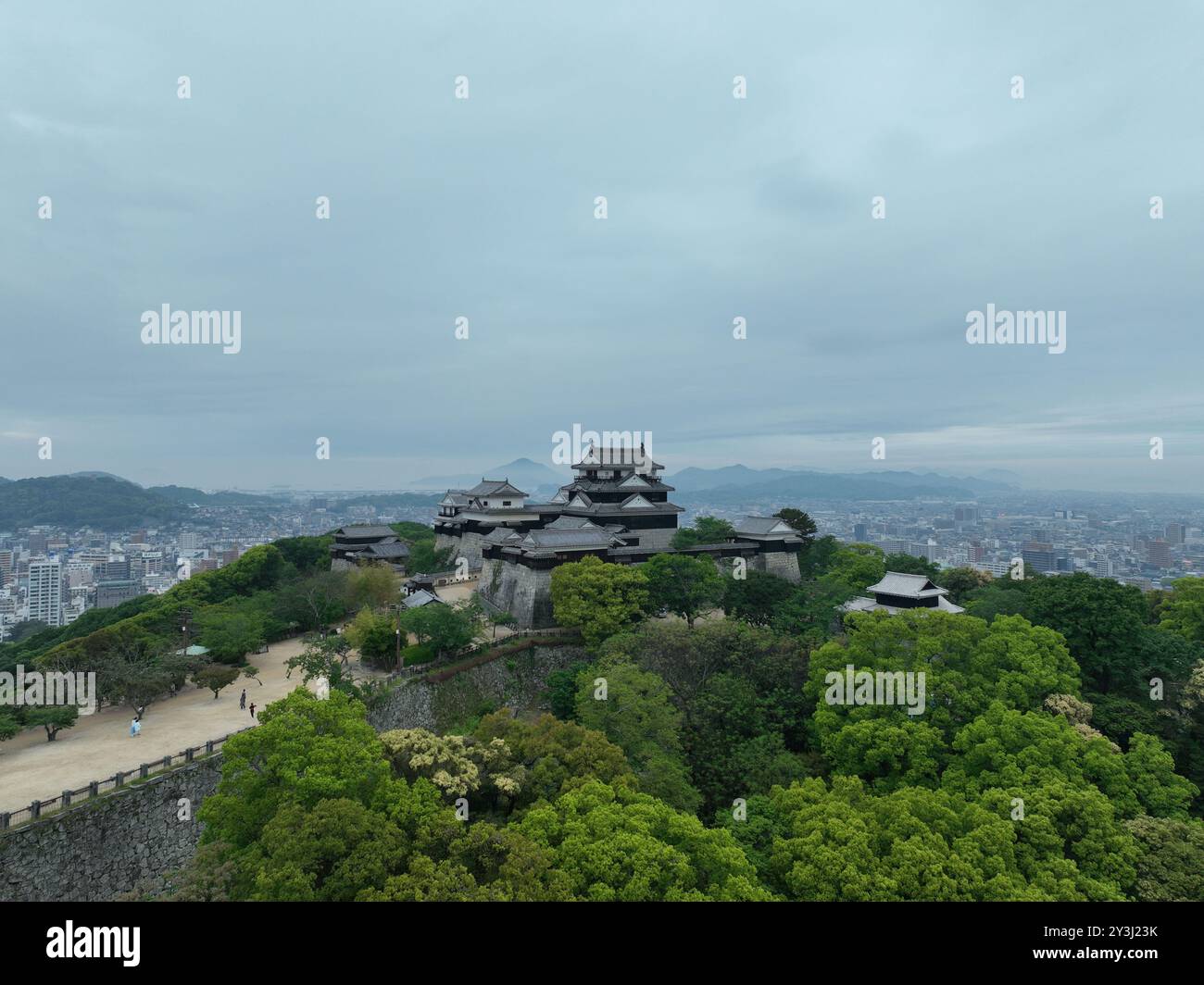 Aerial Image of Matsuyama Castle on an overcast day Stock Photo - Alamy