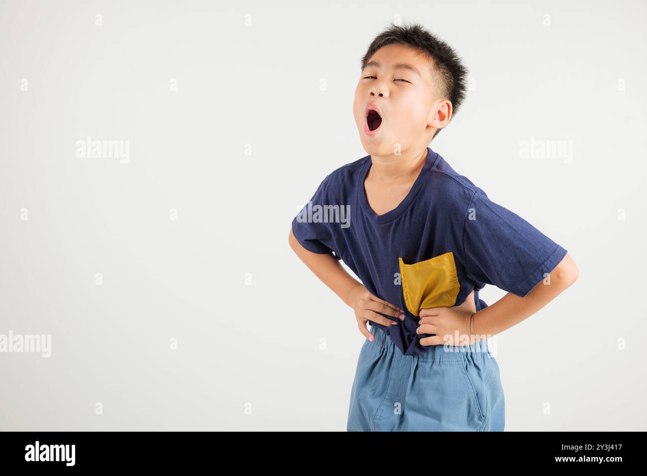 Portrait of Asian young kid boy has stomachache, primary child ...