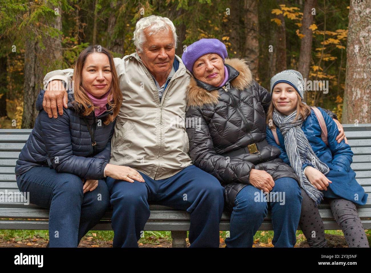 Happy three generations family outdoors Stock Photo - Alamy